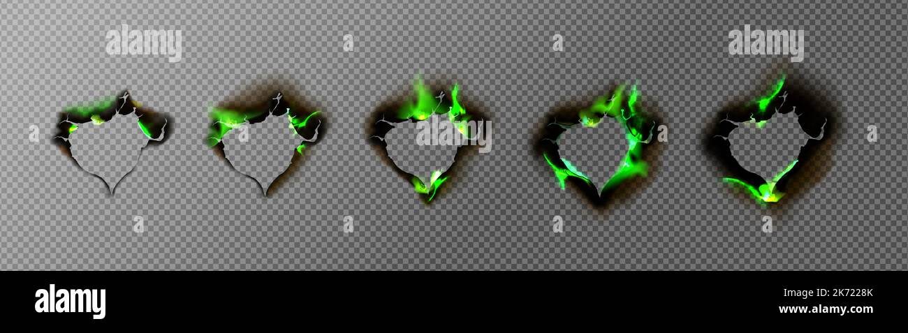 Burnt holes in paper with green fire and scorched edges with black ash ...