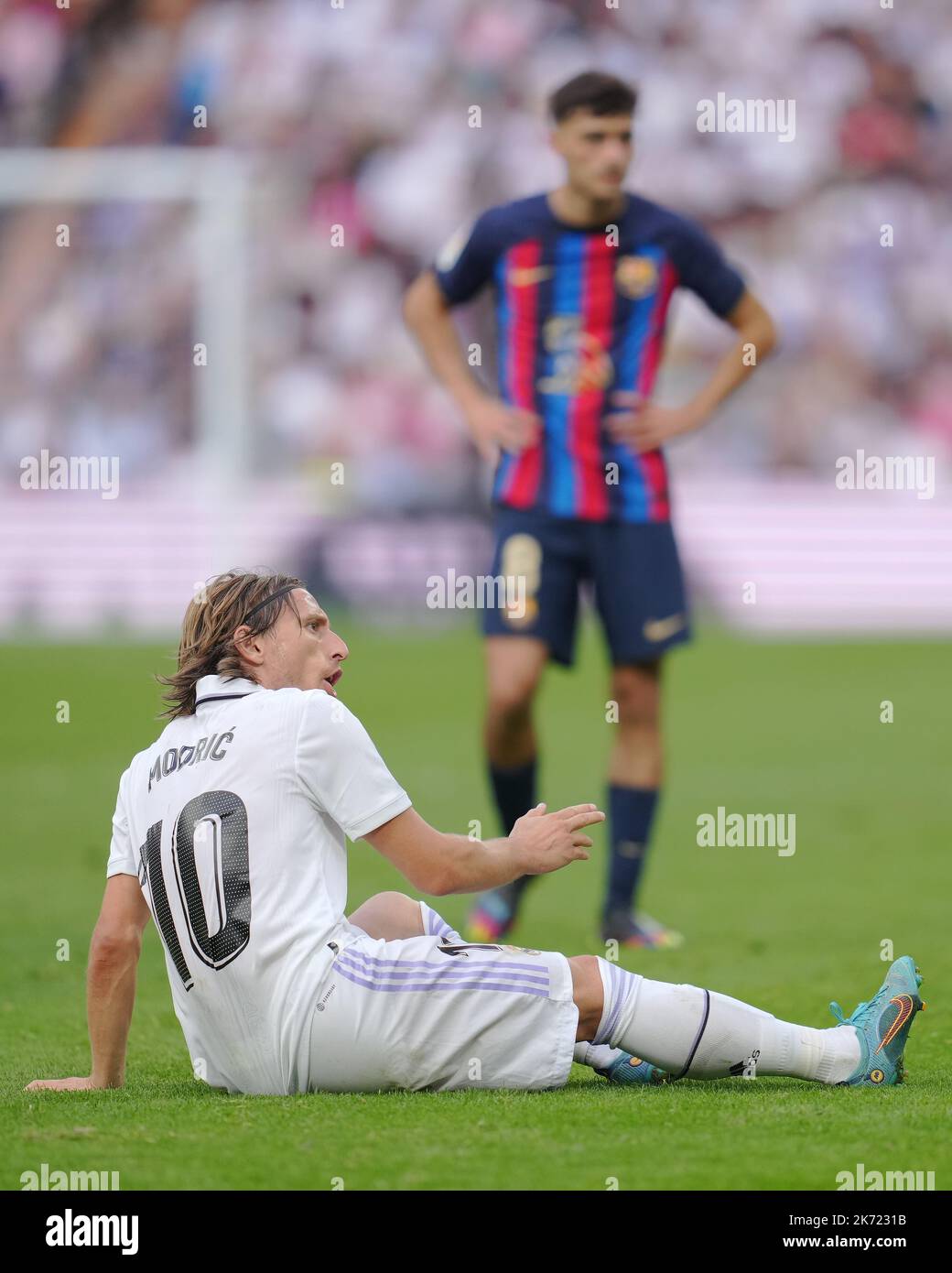 Luka Modric of Real Madrid and Pedro Gonzalez Pedri of FC Barcelona ...
