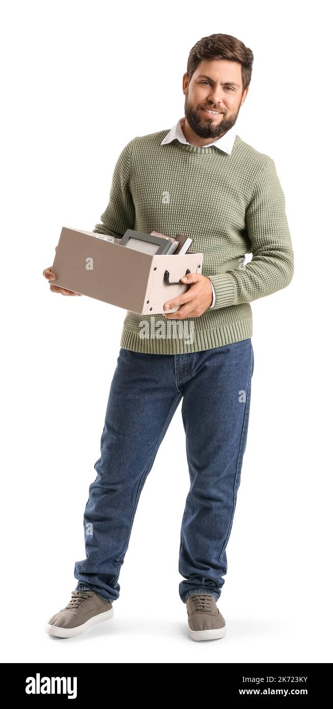 Fired young man holding box with personal stuff on white background ...