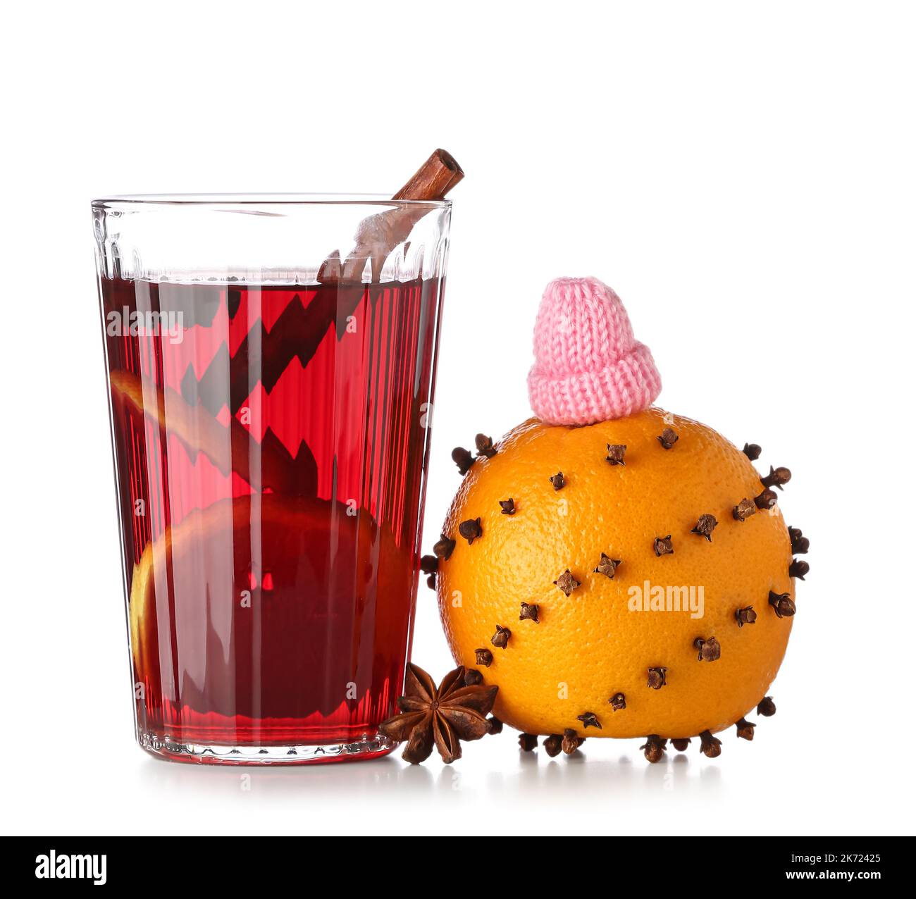 Glass of aromatic mulled wine and orange on white background Stock ...