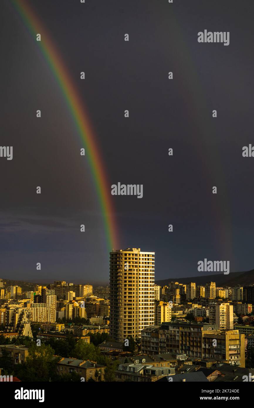 Double rainbow over Tbilisi's downtown after the rain, capital city of ...