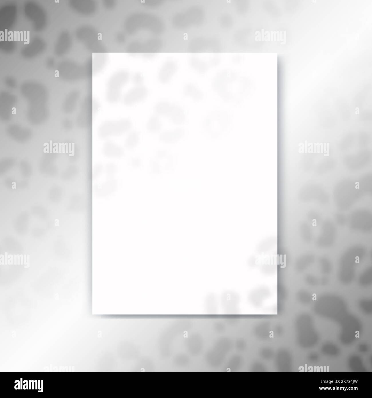 Mock up of empty paper blank. Reflected cheetah print shadow from ...
