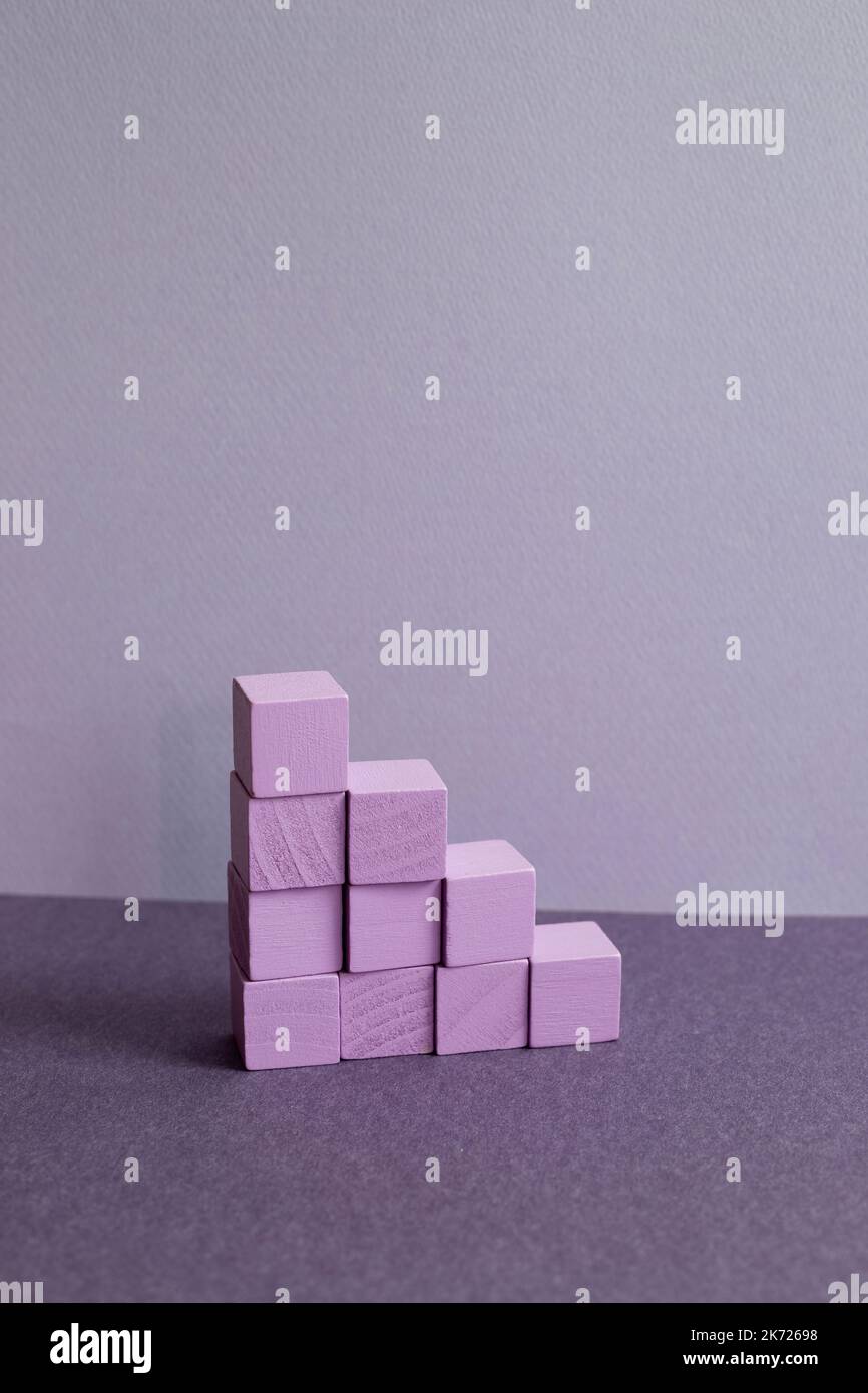 Wood block stairs on purple background. Business development, growth ...