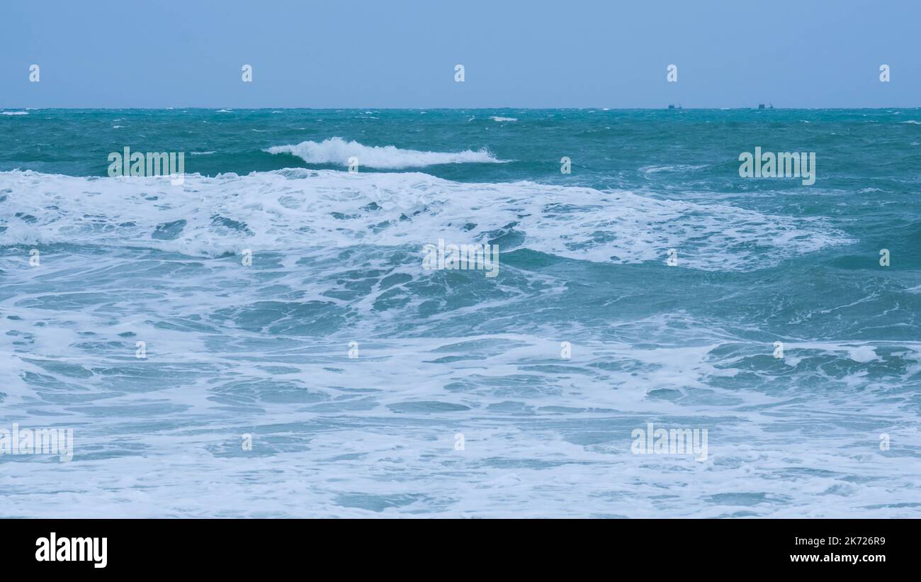 View of sea waves on the beach of tropical seas in Thailand. Strong sea ...
