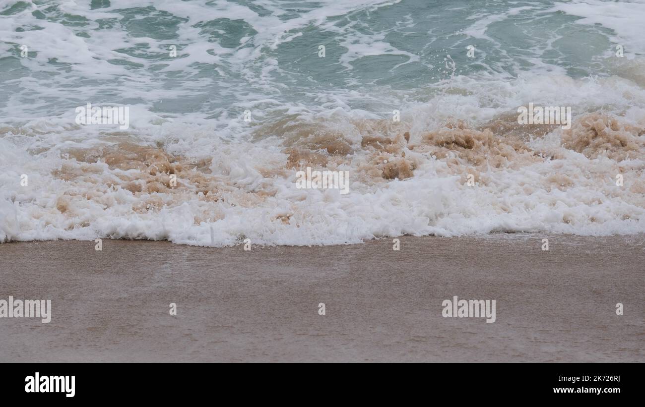 View of ocean waves and sand on the beach of tropical seas in Thailand ...