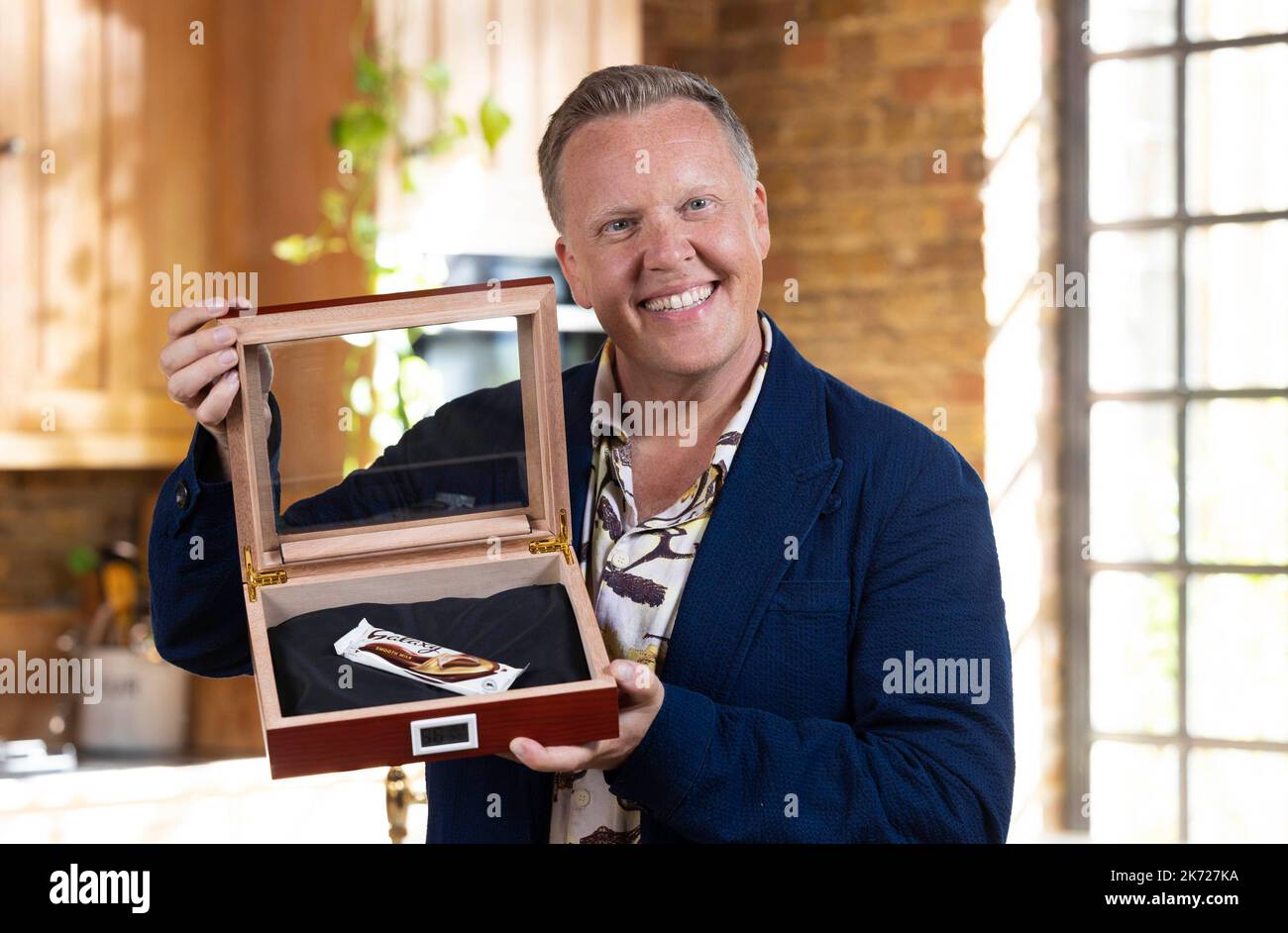 EDITORIAL USE ONLY Wine expert Olly Smith demonstrates one of the rules ...