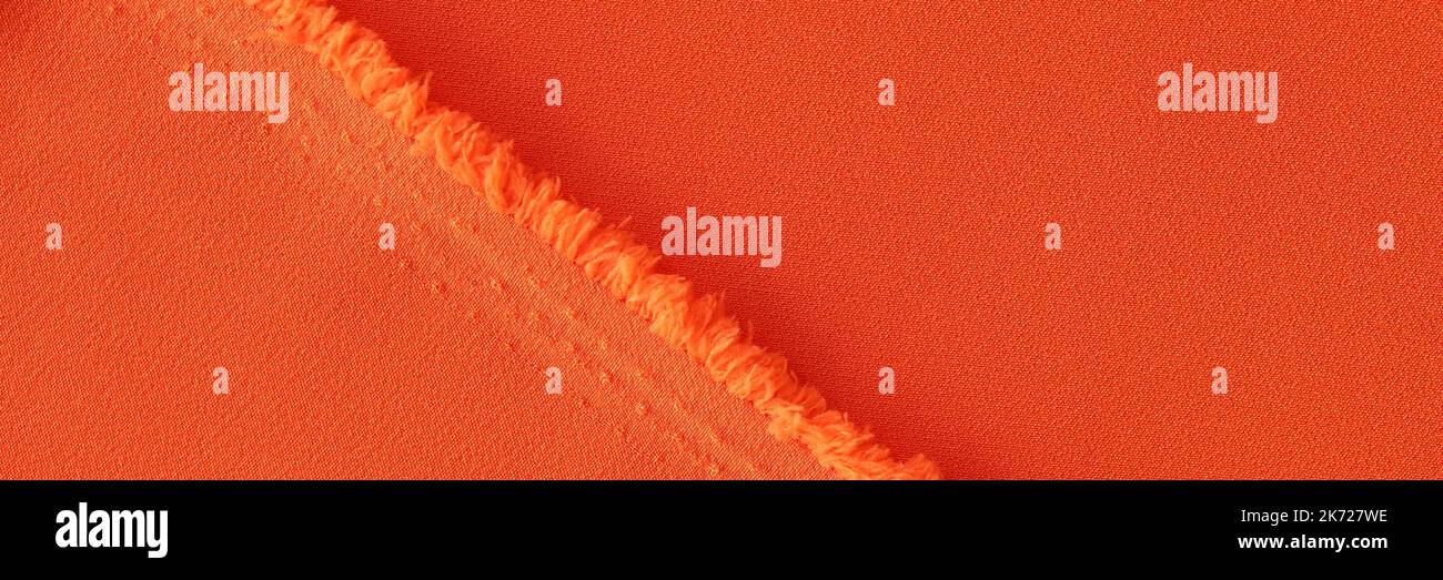 Orange fabric and texture of threads of bright orange fabric with folds ...