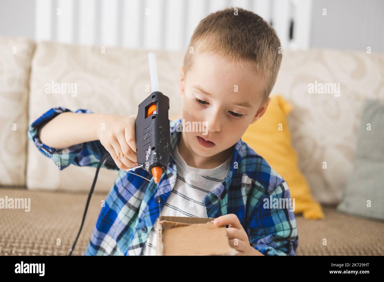 Boy making plastic art hi-res stock photography and images - Alamy