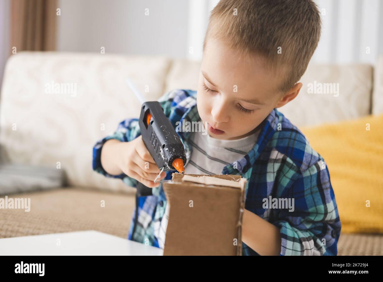 Boy making plastic art hi-res stock photography and images - Alamy