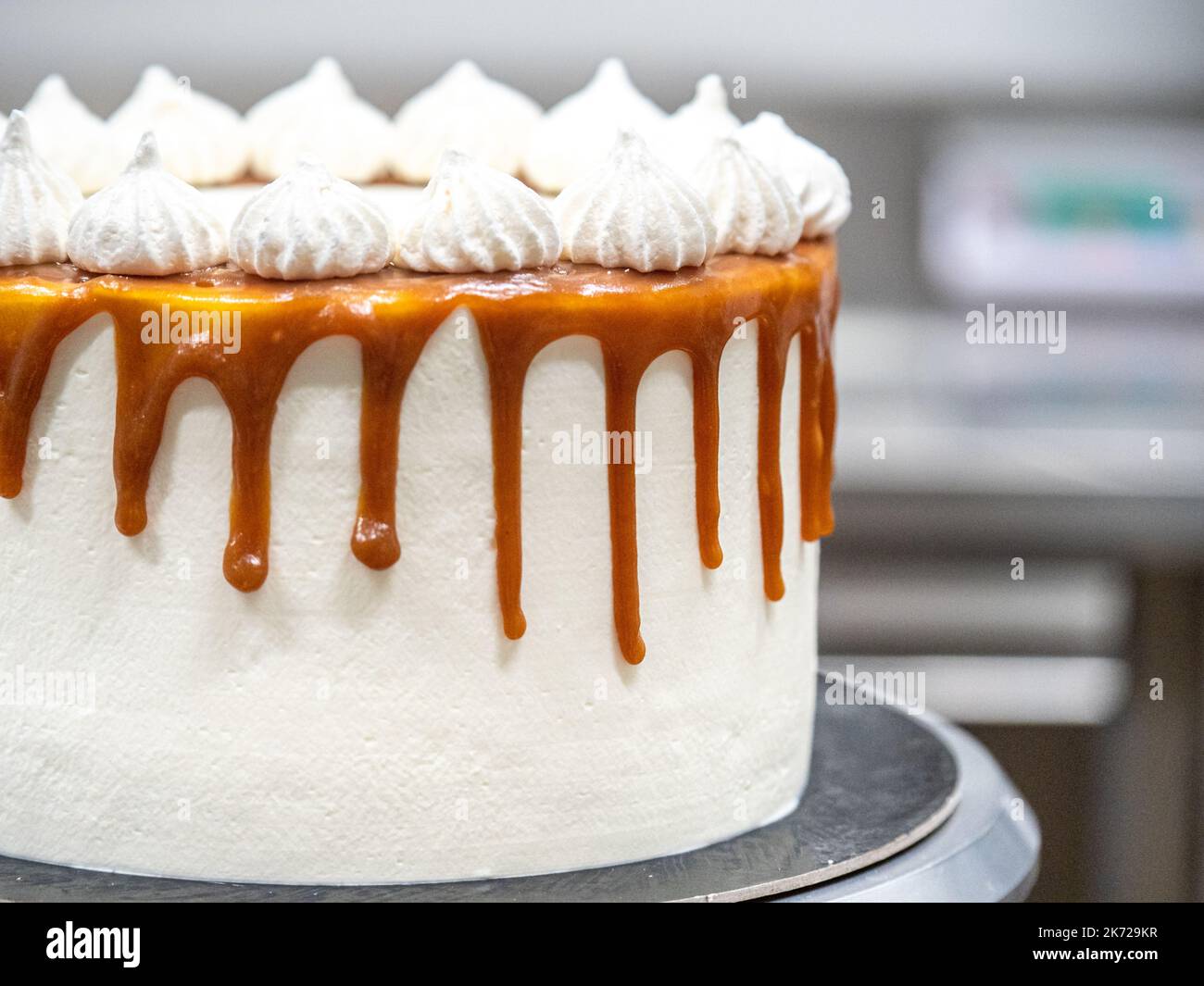 food artisan desginer topping a sweet icing salty caramel frosted ...