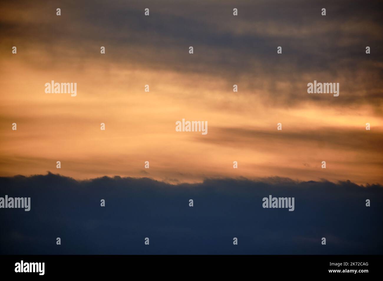 Evening dramatic sky with beige clouds during sunset Stock Photo - Alamy
