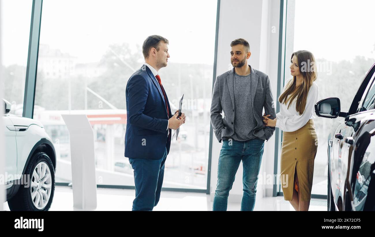 Polite showroom manager car hi-res stock photography and images - Alamy