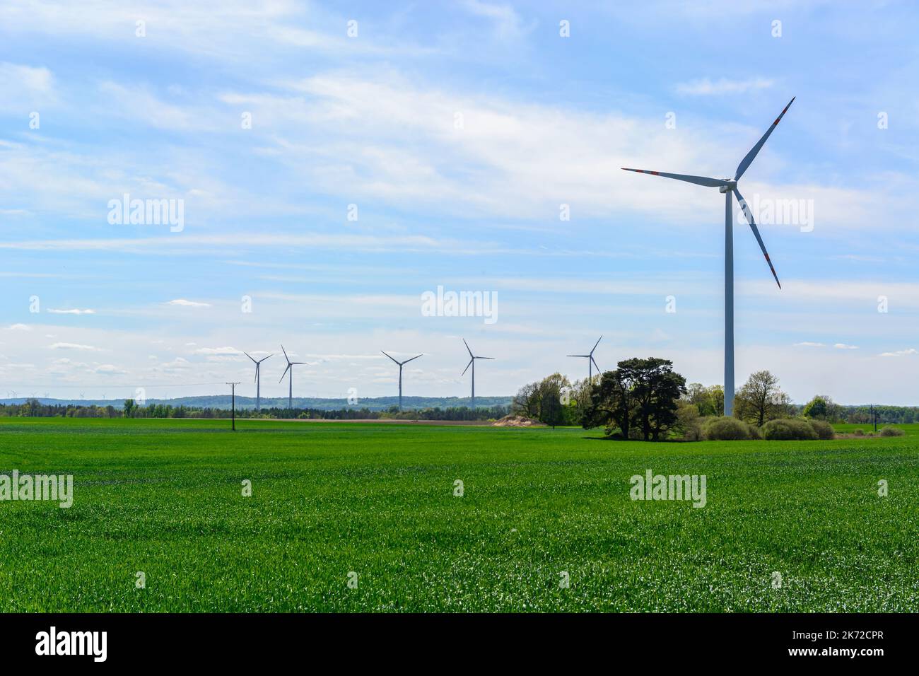 windmill wind turbines in field, power generator electric pylon wind ...