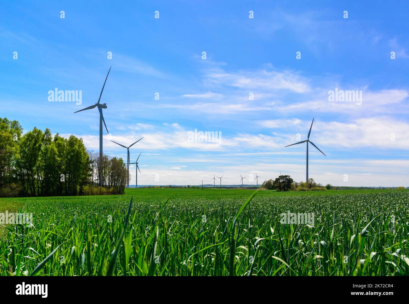 windmill wind turbines in field, power generator electric pylon wind ...