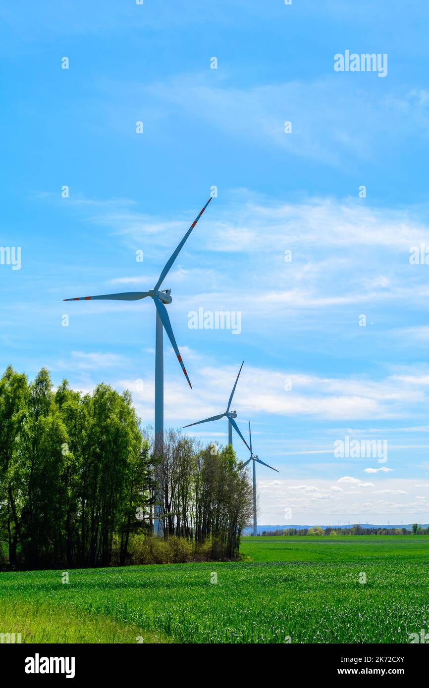 windmill wind turbines in field, power generator electric pylon wind ...