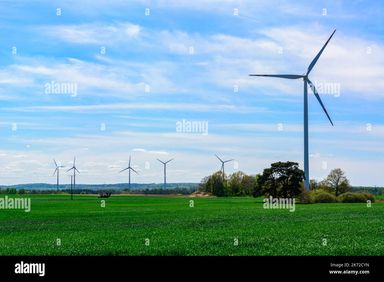windmill wind turbines in field, power generator electric pylon wind ...