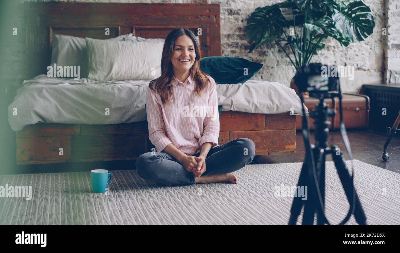 Attractive asian woman famous blogger is recording video for her online ...