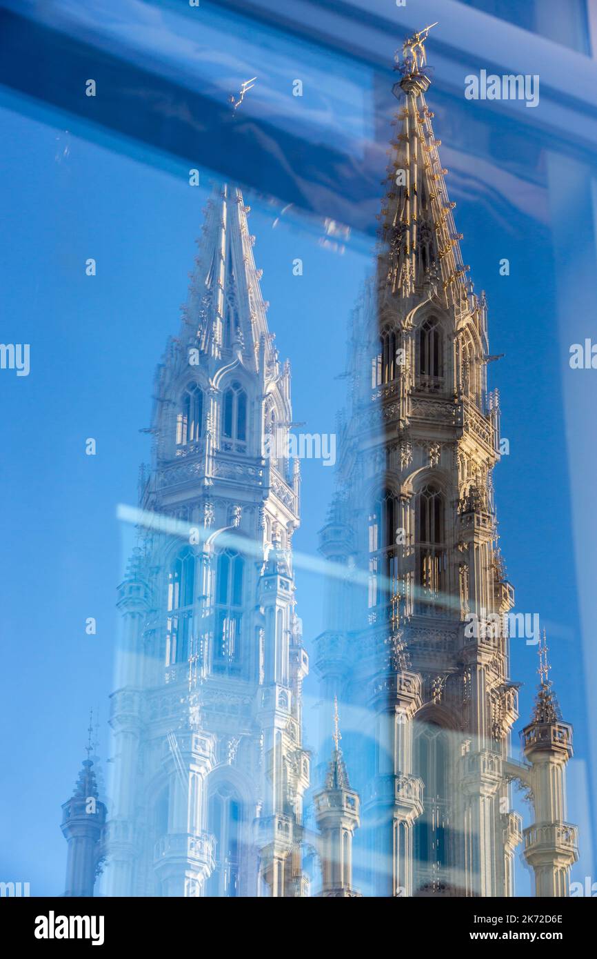 Reflection, in a double glazed window, of the tower of the Hôtel de ...