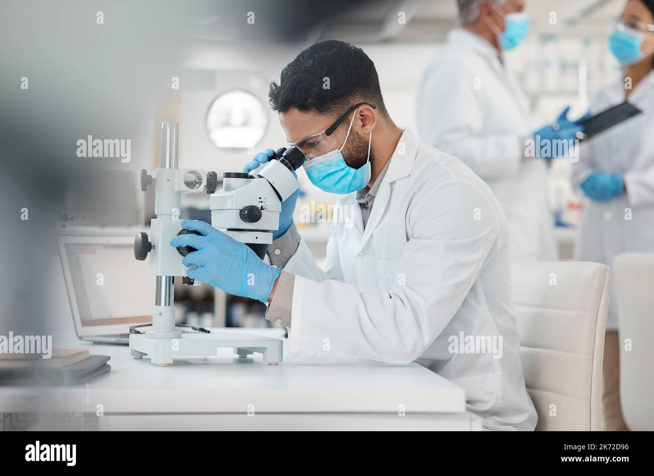 This case is bigger than I imagined. a young scientist using a ...