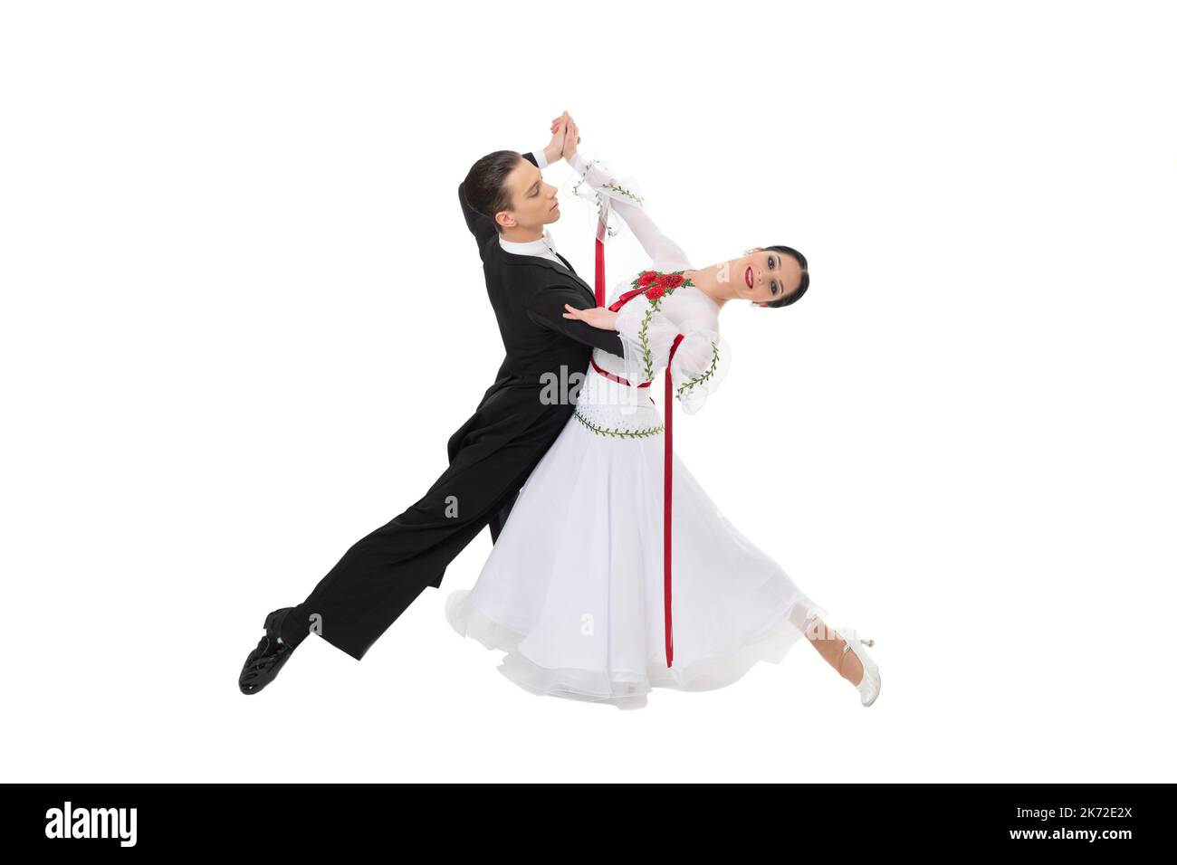 couple of professional ballroom dancers dancing isolated on white ...