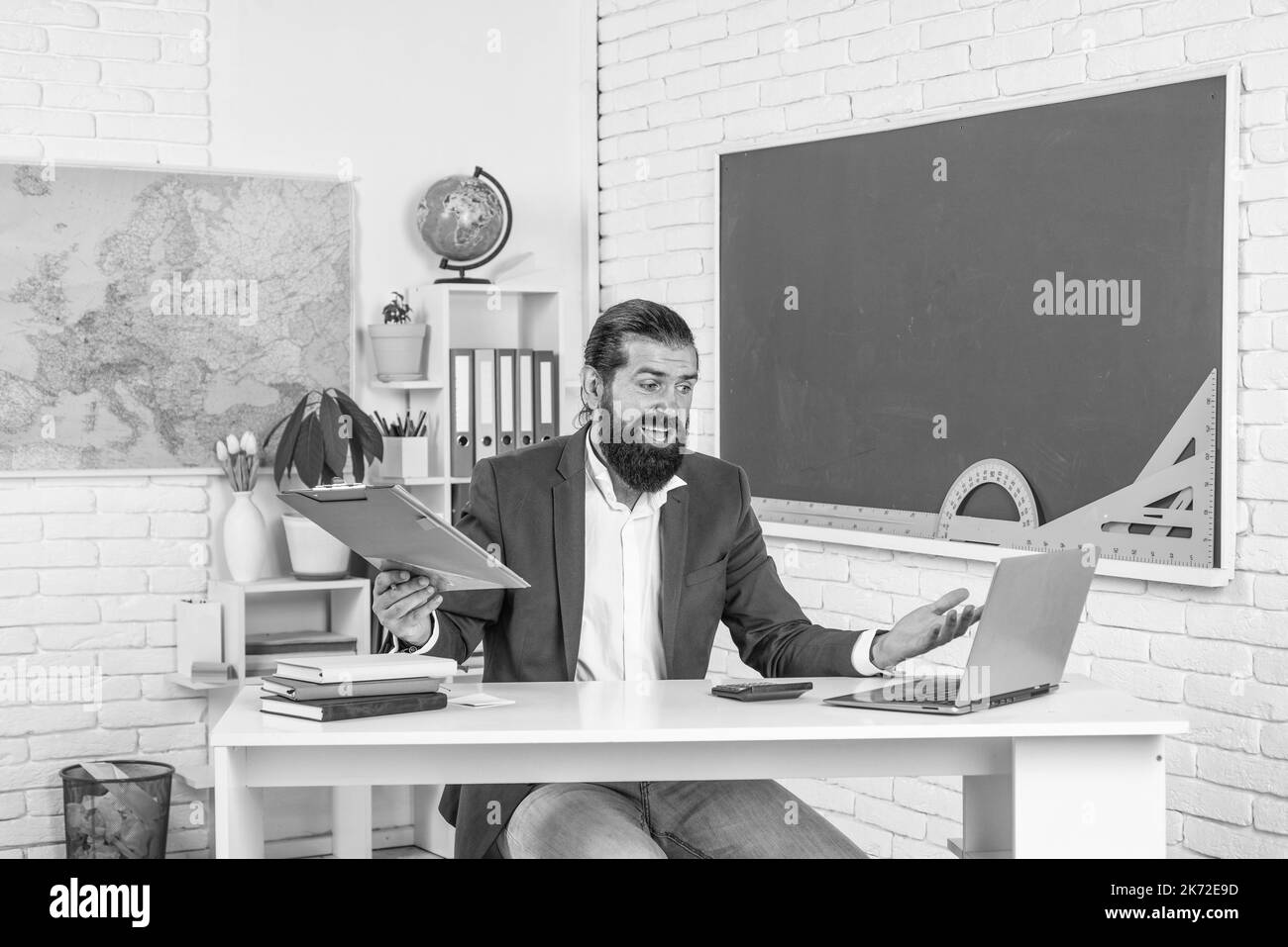 Widening your Knowledge. informal education. male student sit in school ...