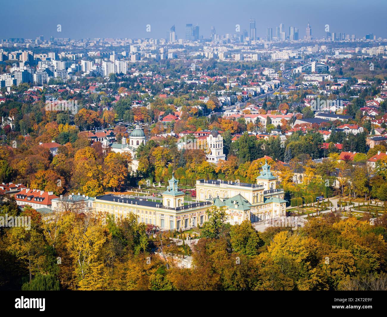 Autumn in Wilanow palace garden, Warsaw distant city center aerial view ...