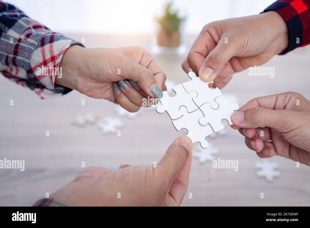 Business group wanting to put pieces of puzzle together. jigsaw puzzle ...