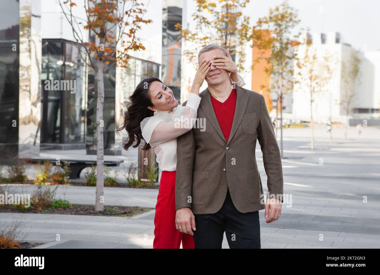 Beautiful Asian woman prepared surprise for her male friend and closing ...