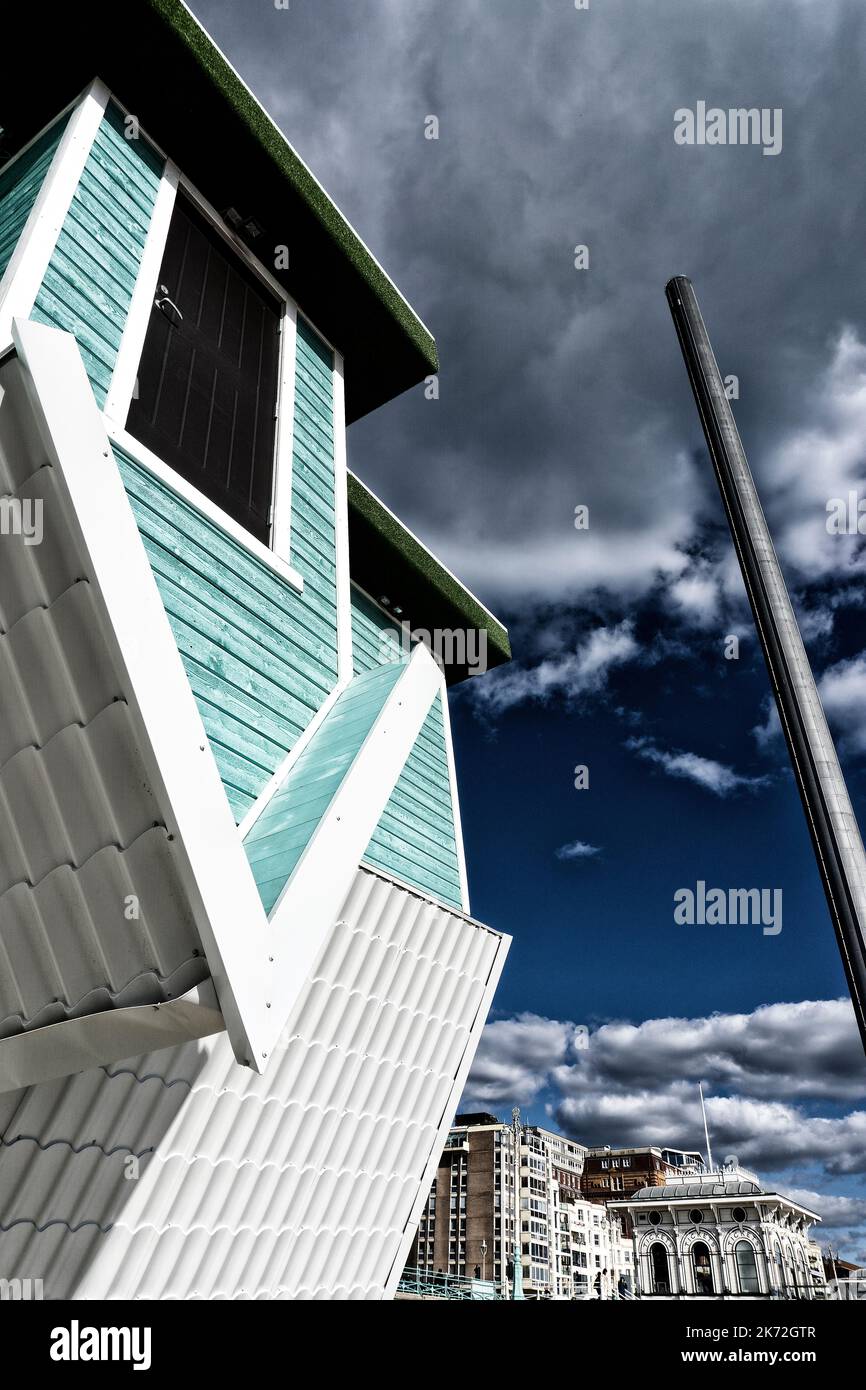 Upside down house on Brighton seafront photographed from a low angle in ...