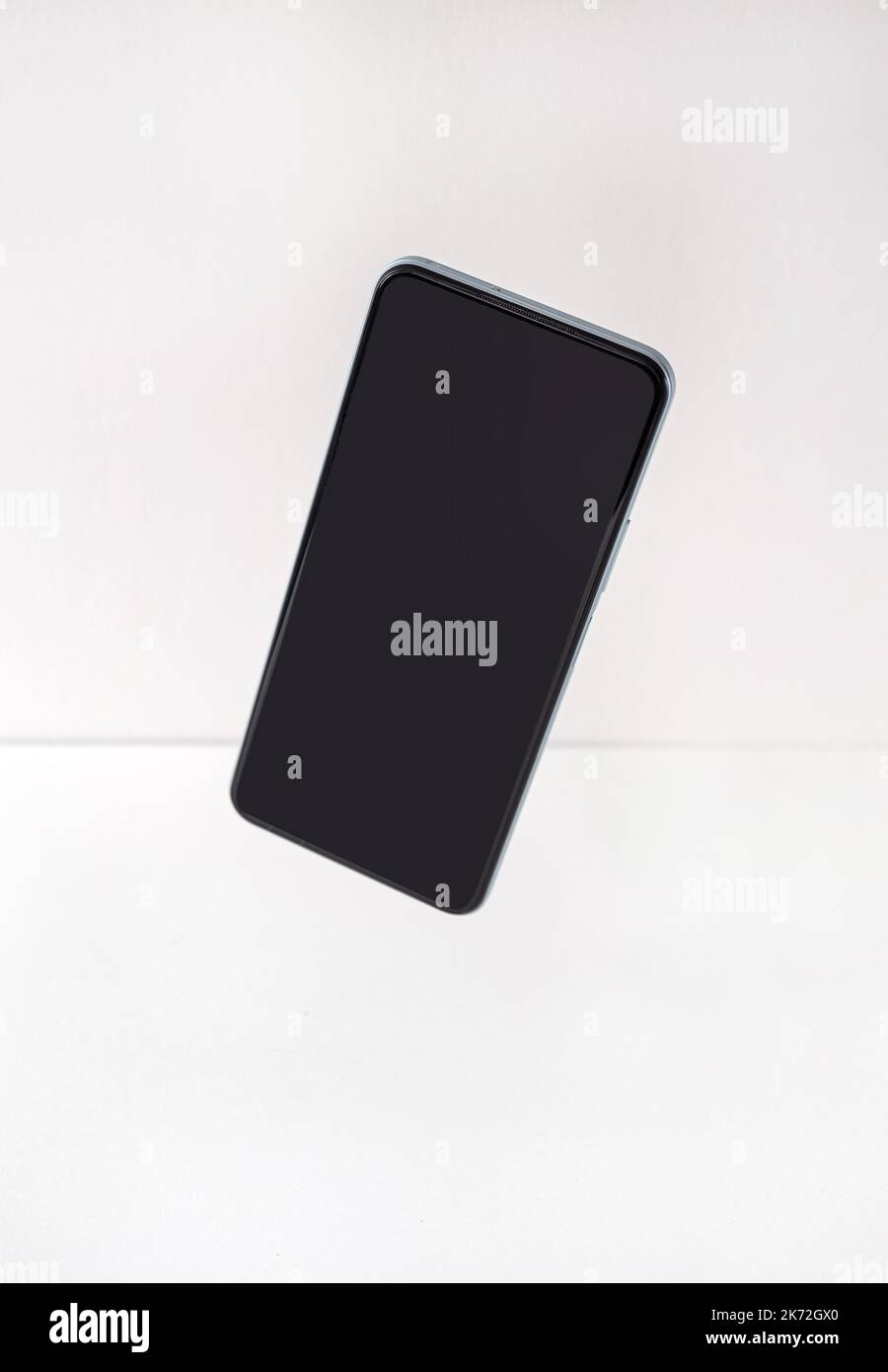 Smartphone mockup, phone with blank screen and shadow flying on white ...