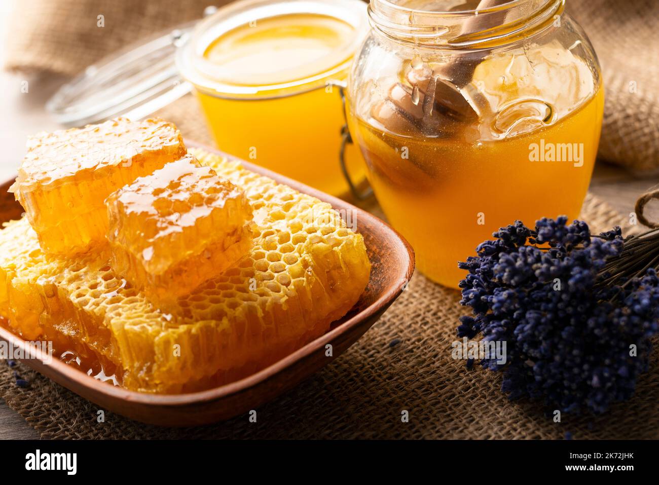 Honeycomb in clay dish on kitchen table sweet background Stock Photo ...