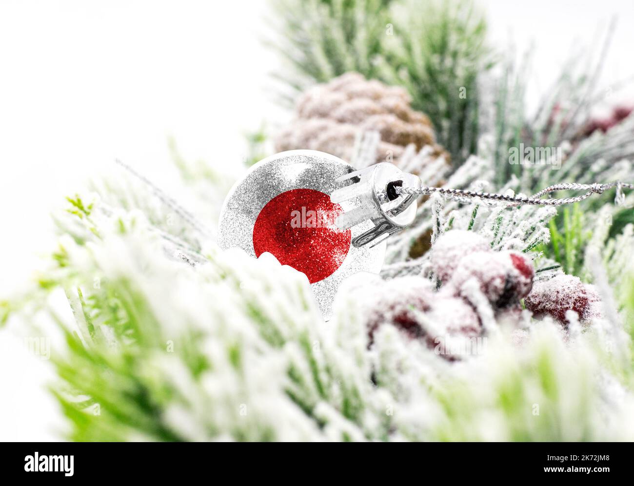 New Year's colorful background with a ball on which the flag of Japan ...