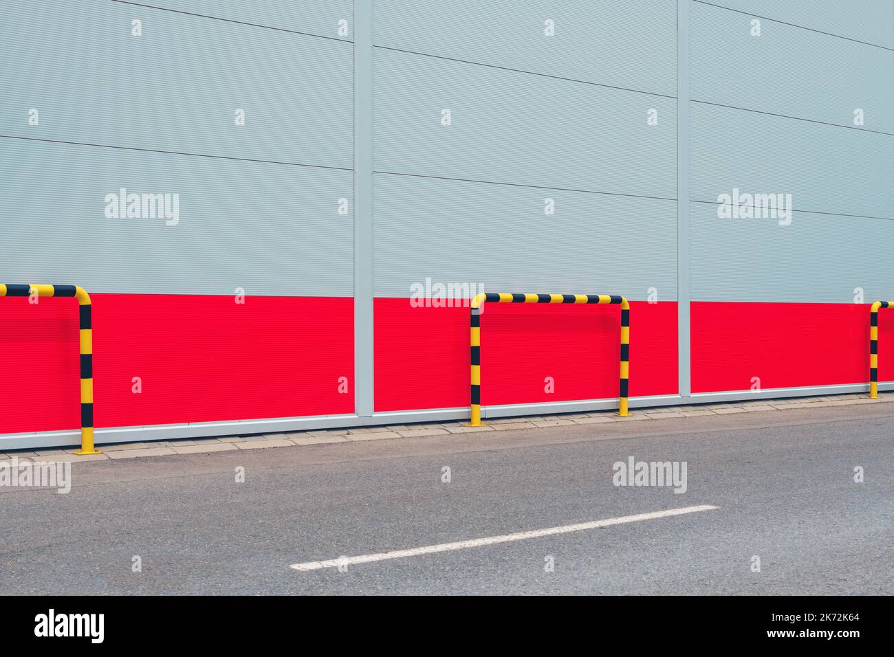 Impact protection guarding rail, yellow and black stripped bollard as ...