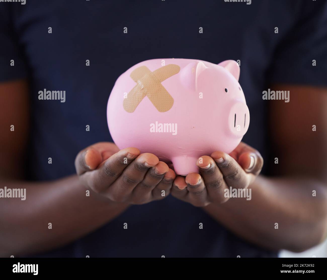 Its never too late to pay off your debt. an unrecognisable man holding ...