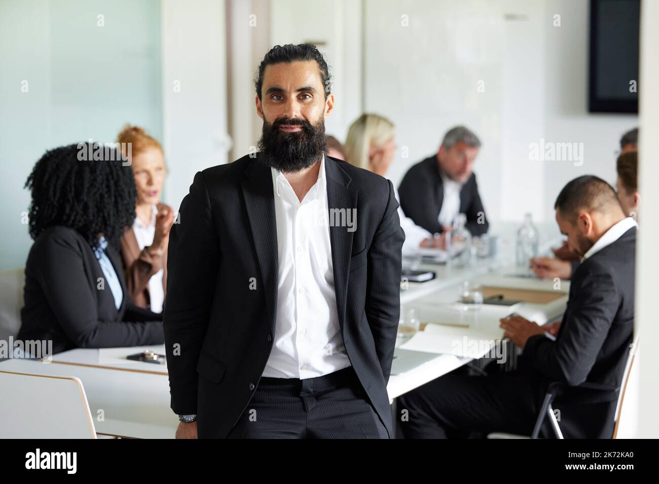 Businessman portrait boardroom hi-res stock photography and images - Alamy