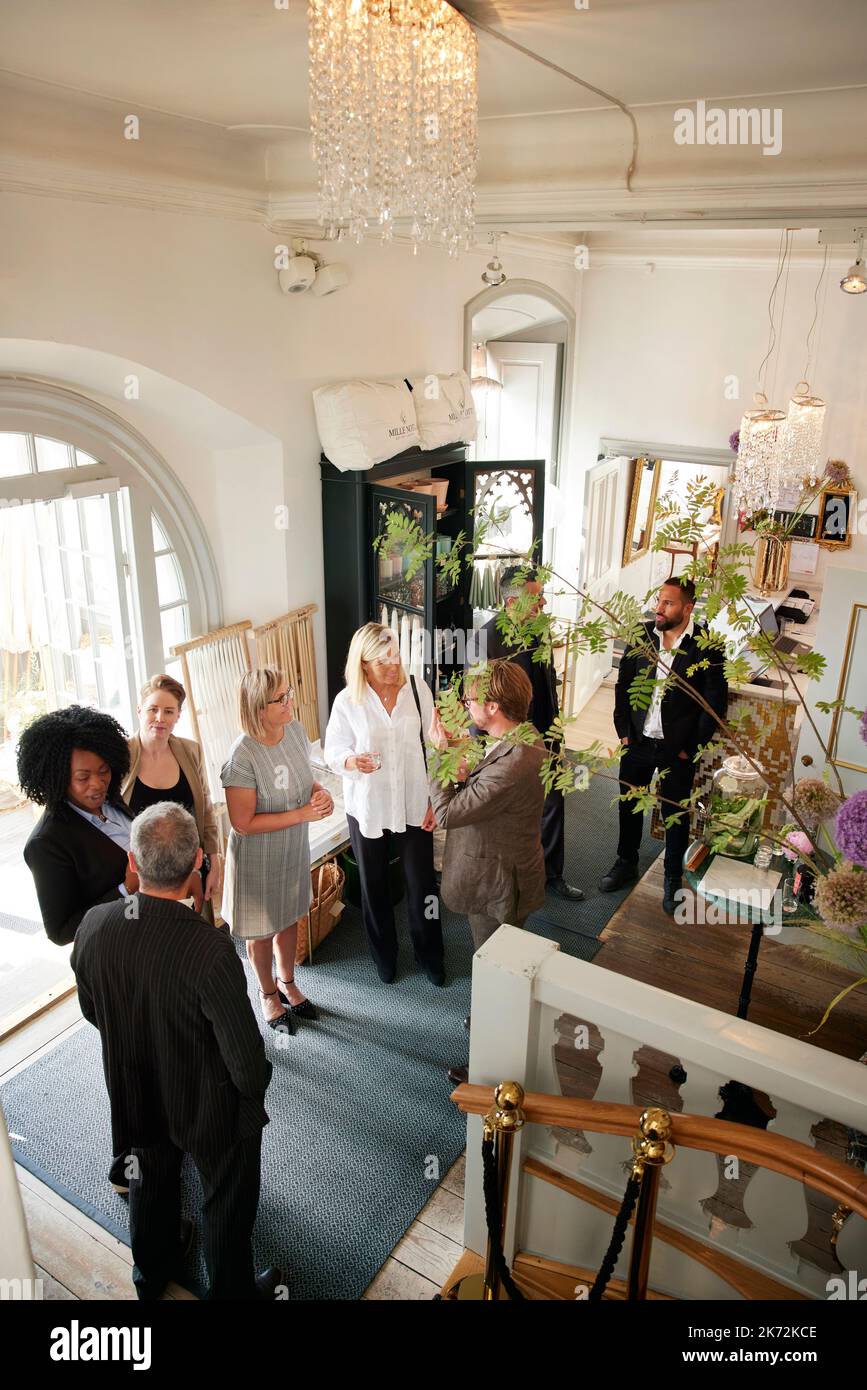 Business people talking together Stock Photo - Alamy