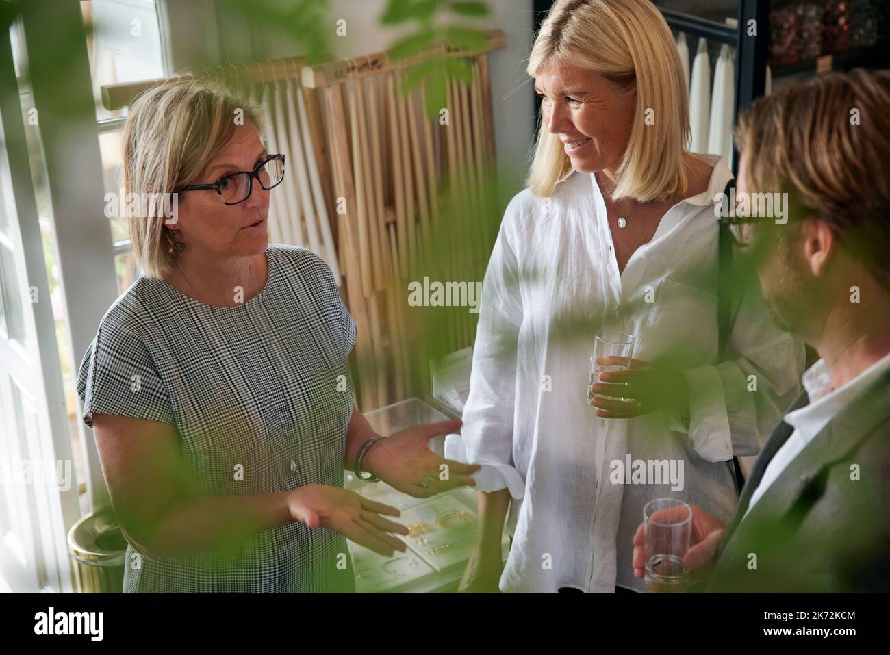 Business people talking together Stock Photo - Alamy