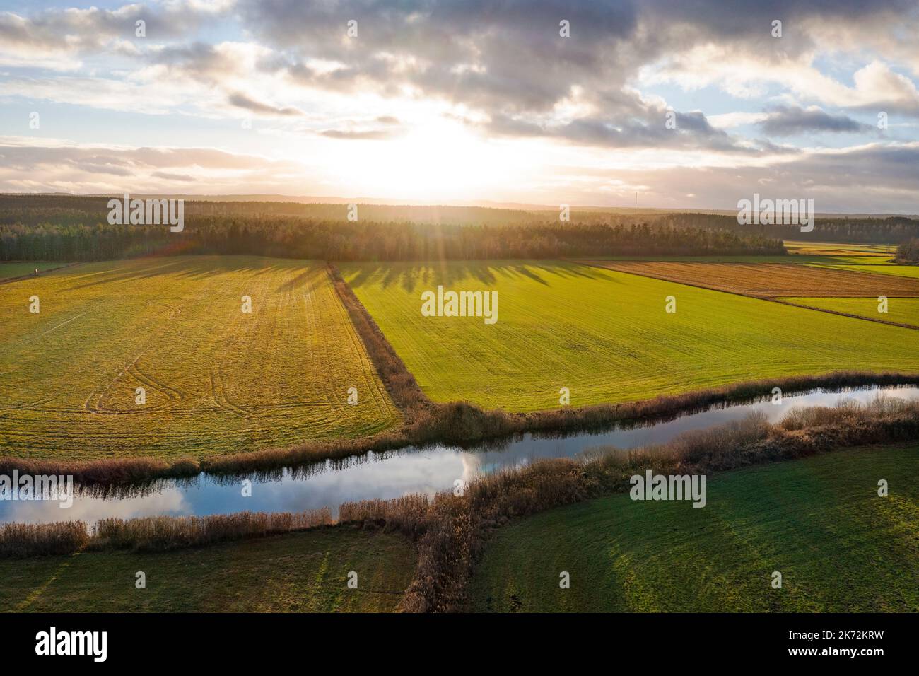 High angle view of river and fields Stock Photo - Alamy