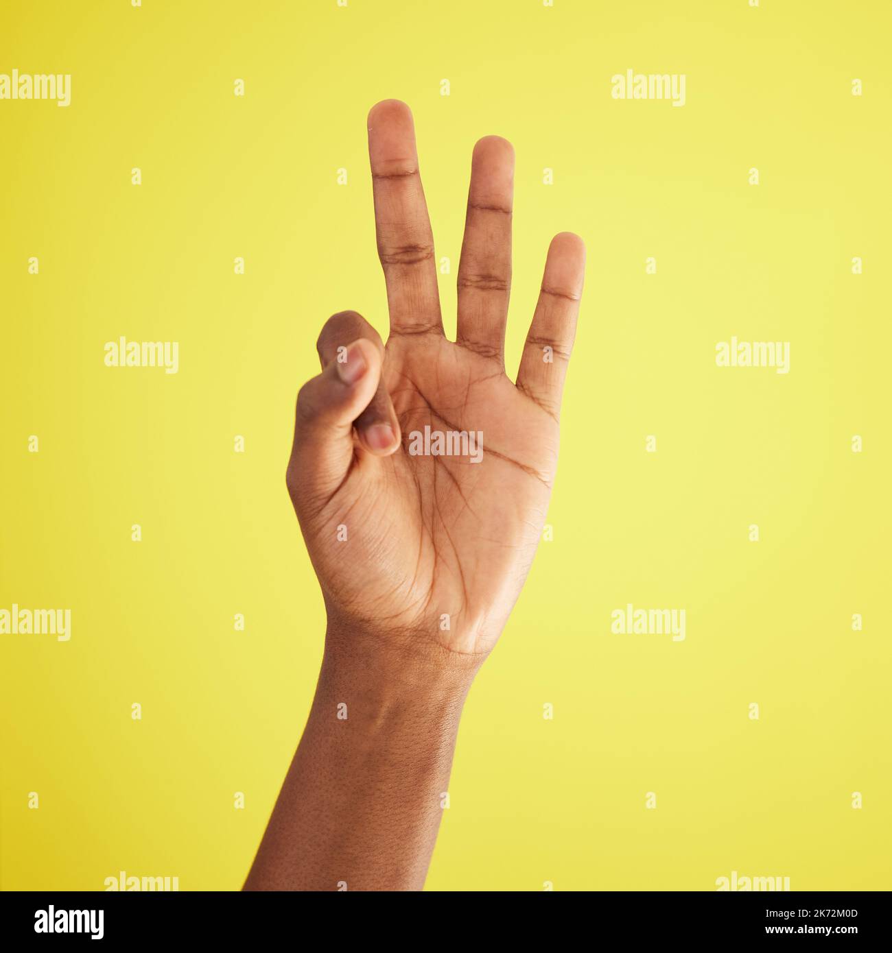 Third times a charm. Studio shot of an unrecognisable man showing three ...