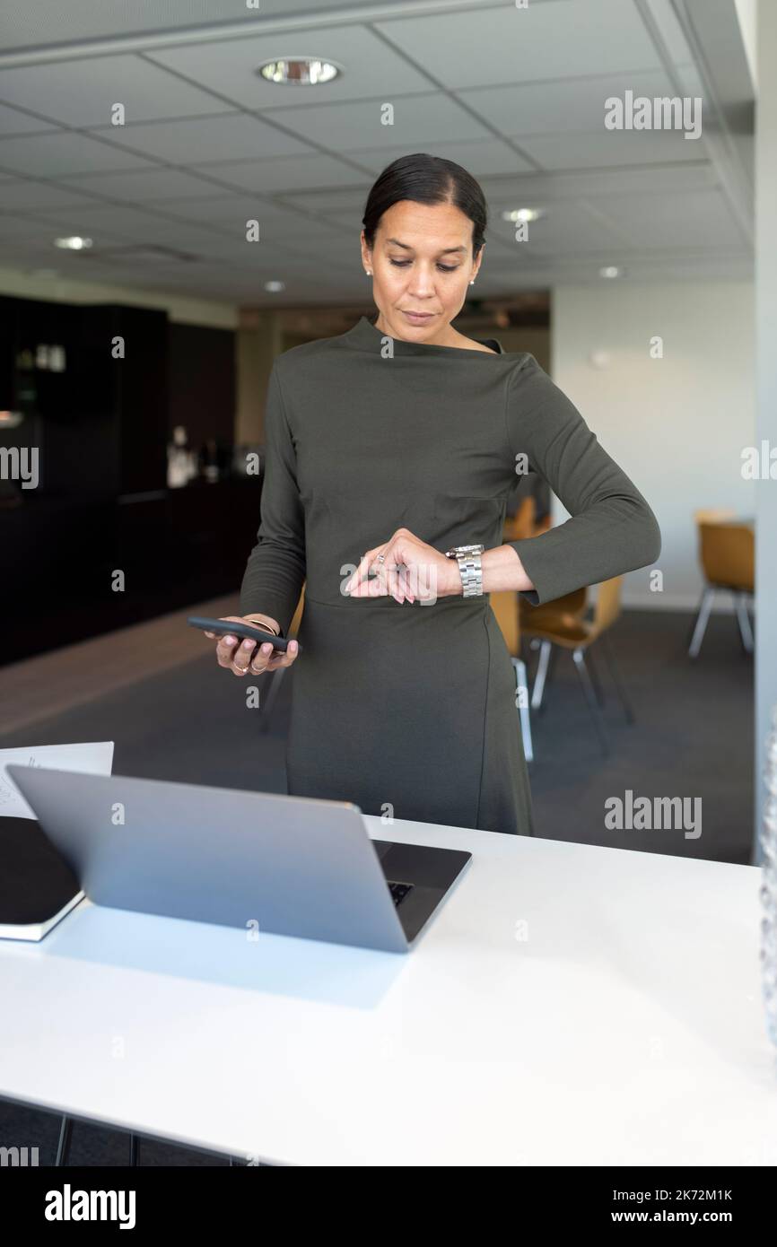 Woman working in office Stock Photo - Alamy