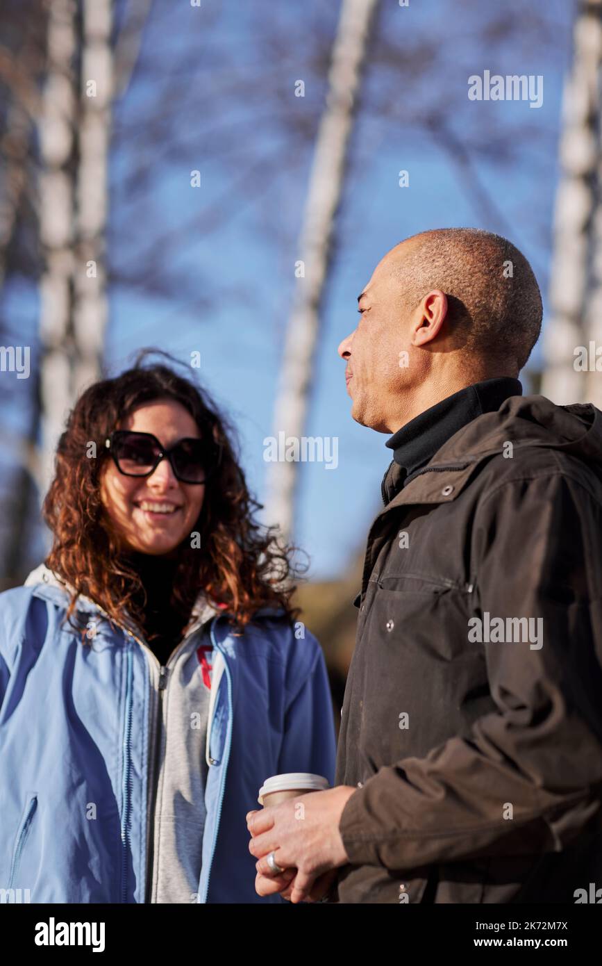 Couple standing together Stock Photo - Alamy