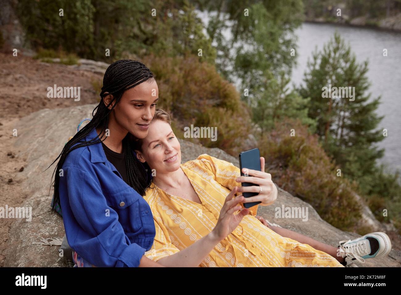 Female couple taking selfie outdoors Stock Photo - Alamy