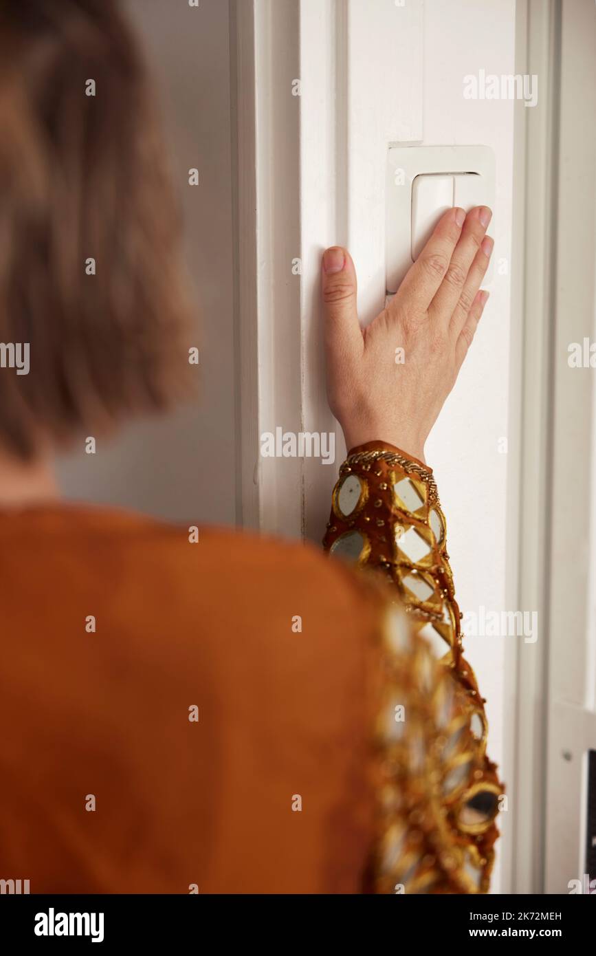 Light switch and hand hi-res stock photography and images - Alamy