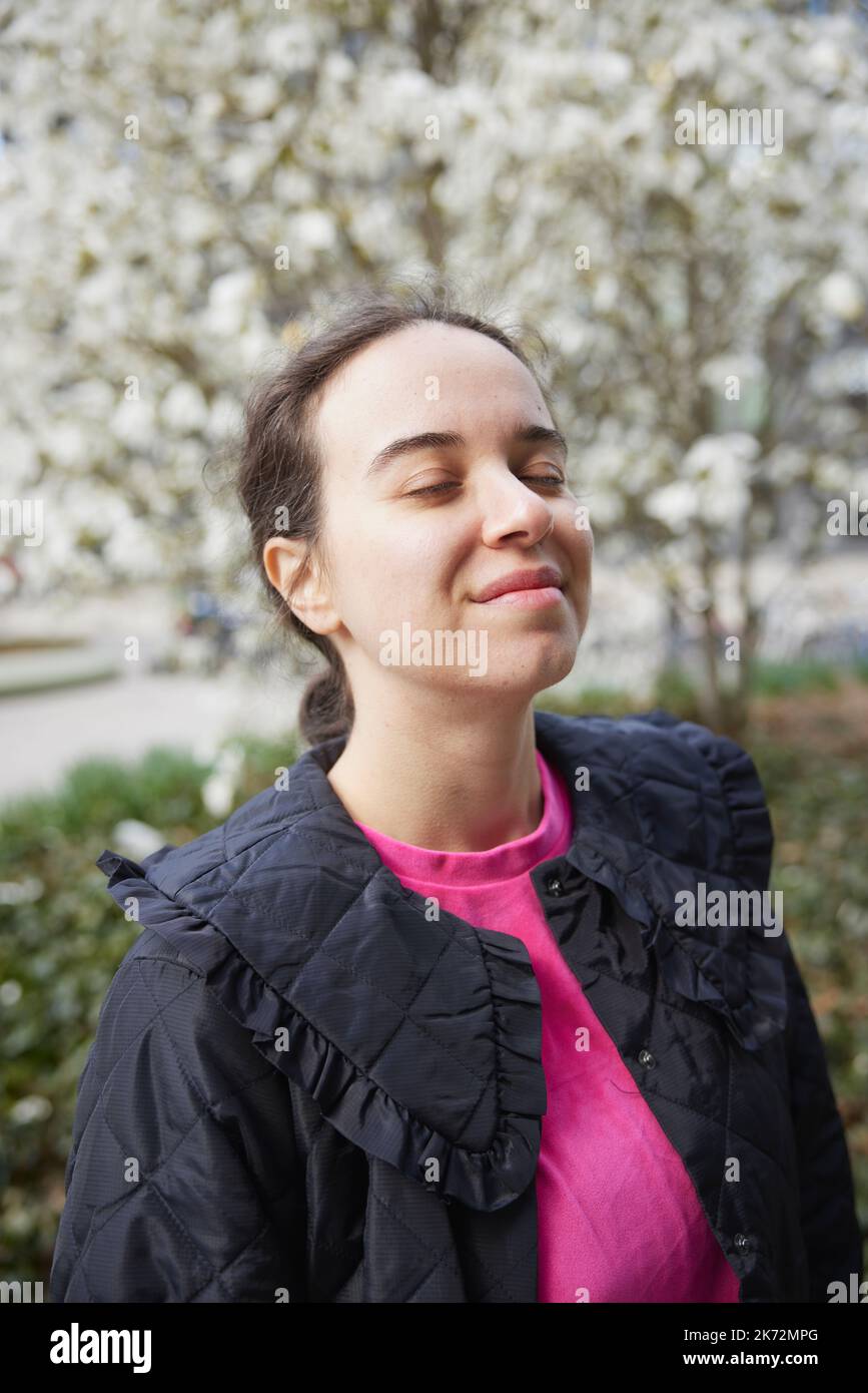 Portrait of woman with eyes shut Stock Photo - Alamy