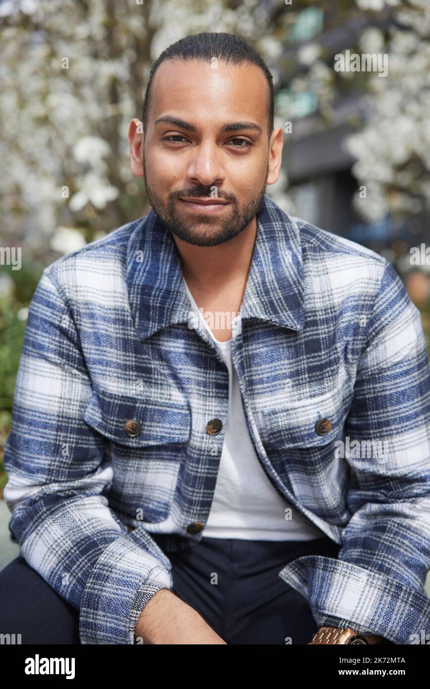 Smiling man looking at camera Stock Photo - Alamy