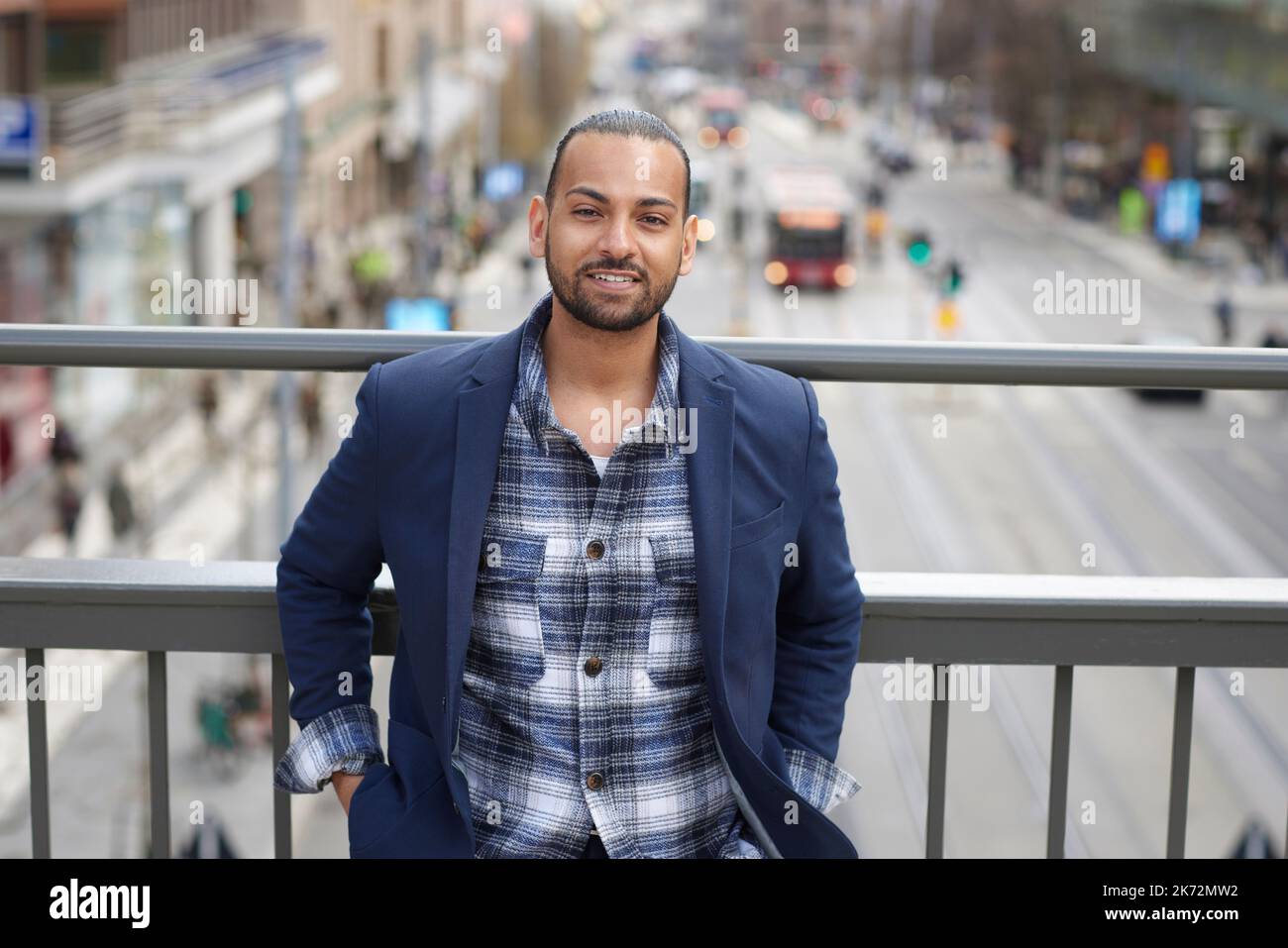 Smiling man looking at camera Stock Photo - Alamy
