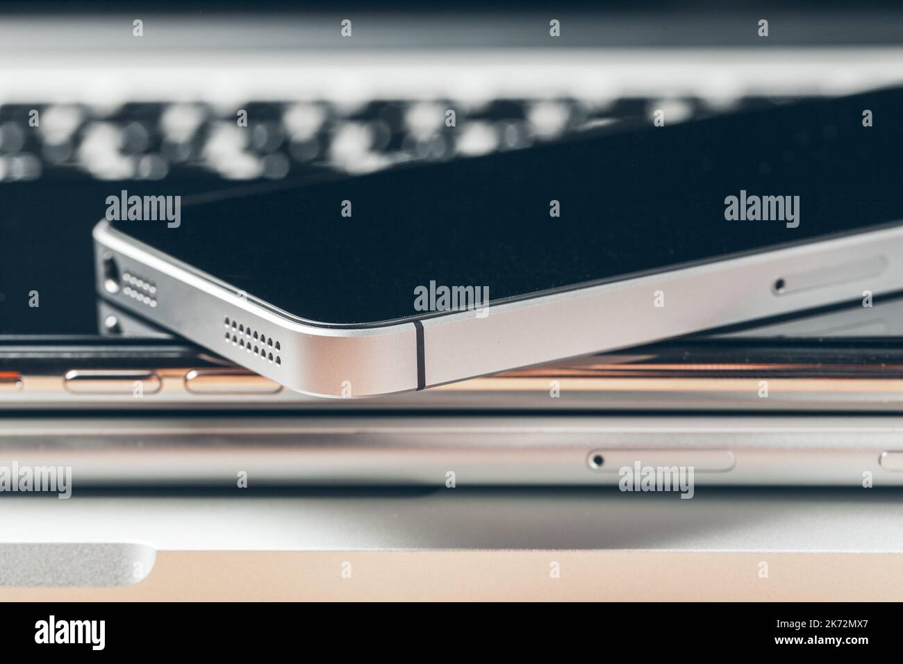 Laptop and mobile phone on the table. Workspace concept Stock Photo - Alamy