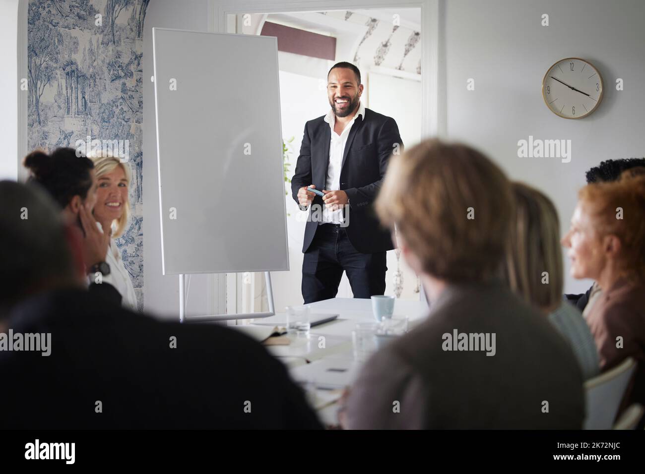 Man having presentation at business meeting Stock Photo - Alamy