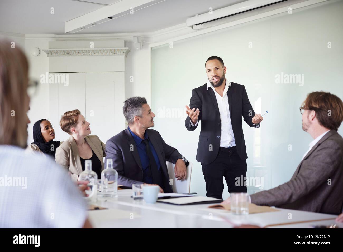Man having presentation at business meeting Stock Photo - Alamy