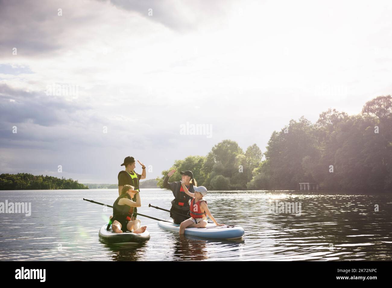 Children paddle hi-res stock photography and images - Alamy